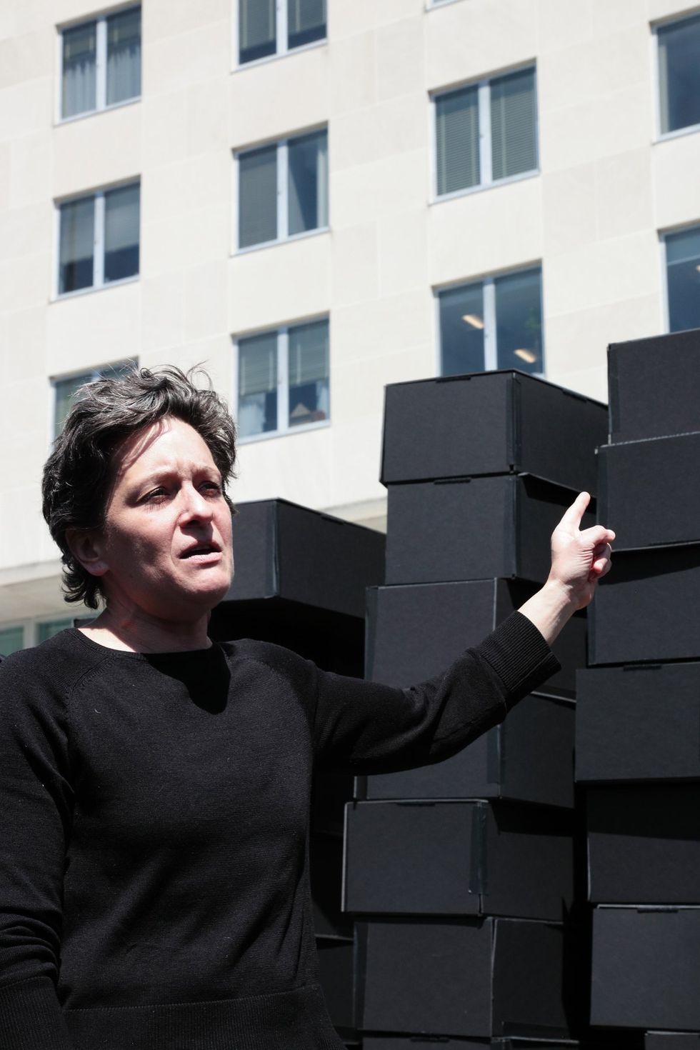 HIV and AIDS activists stack coffins. to protest PEPFAR cuts