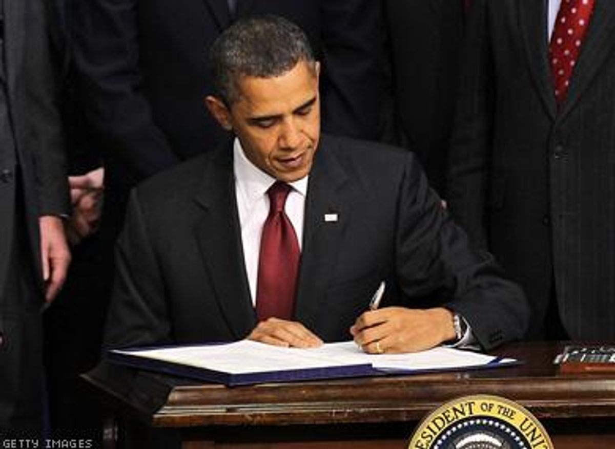 Obama Signs DADT Repeal