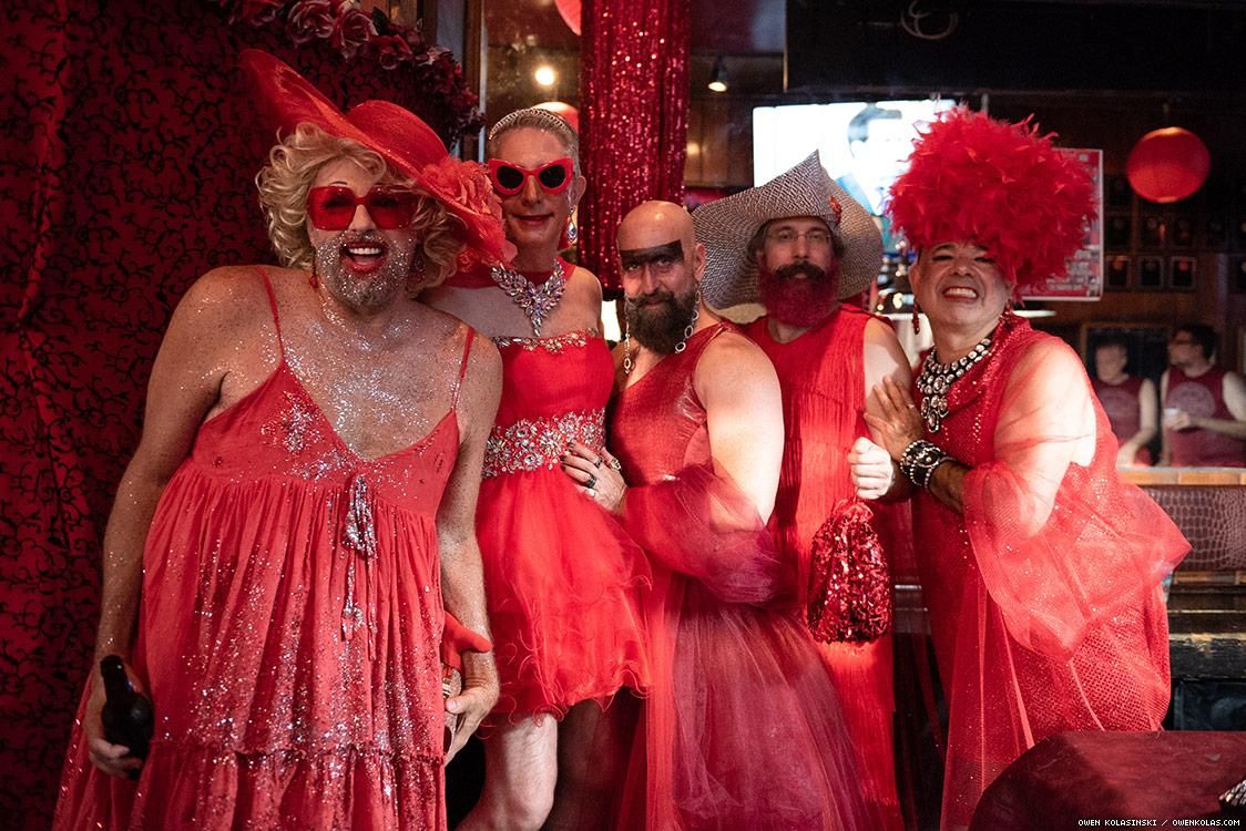 44 Photos of Men Struggling to Keep Their Red Dresses On