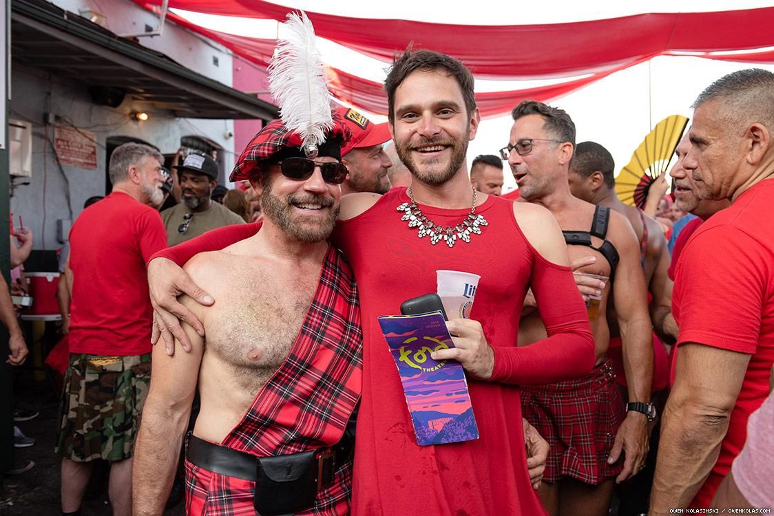 44 Photos of Men Struggling to Keep Their Red Dresses On