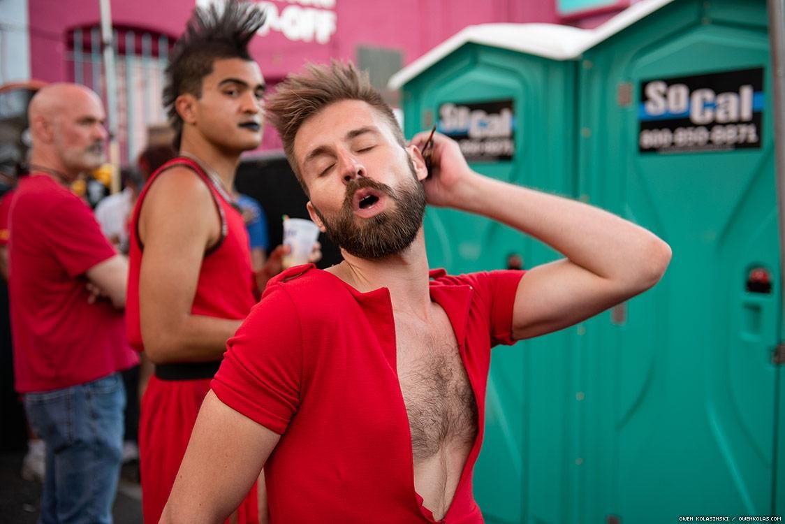 44 Photos of Men Struggling to Keep Their Red Dresses On